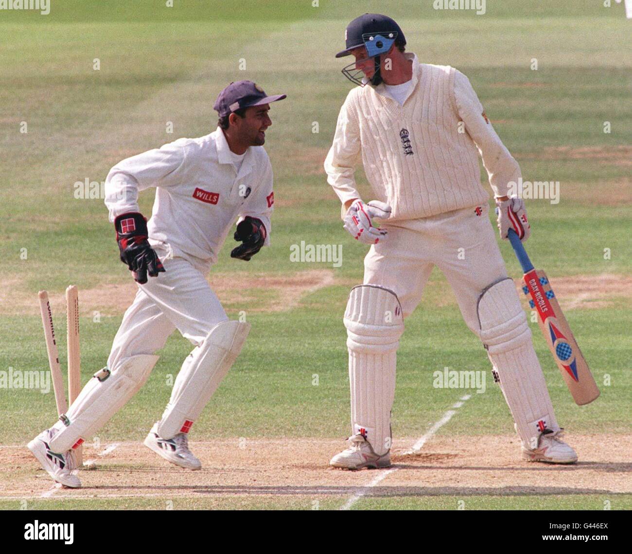 Indian wicket keeper Nayan Mongia celebrates Mike Atherton's wicket ...