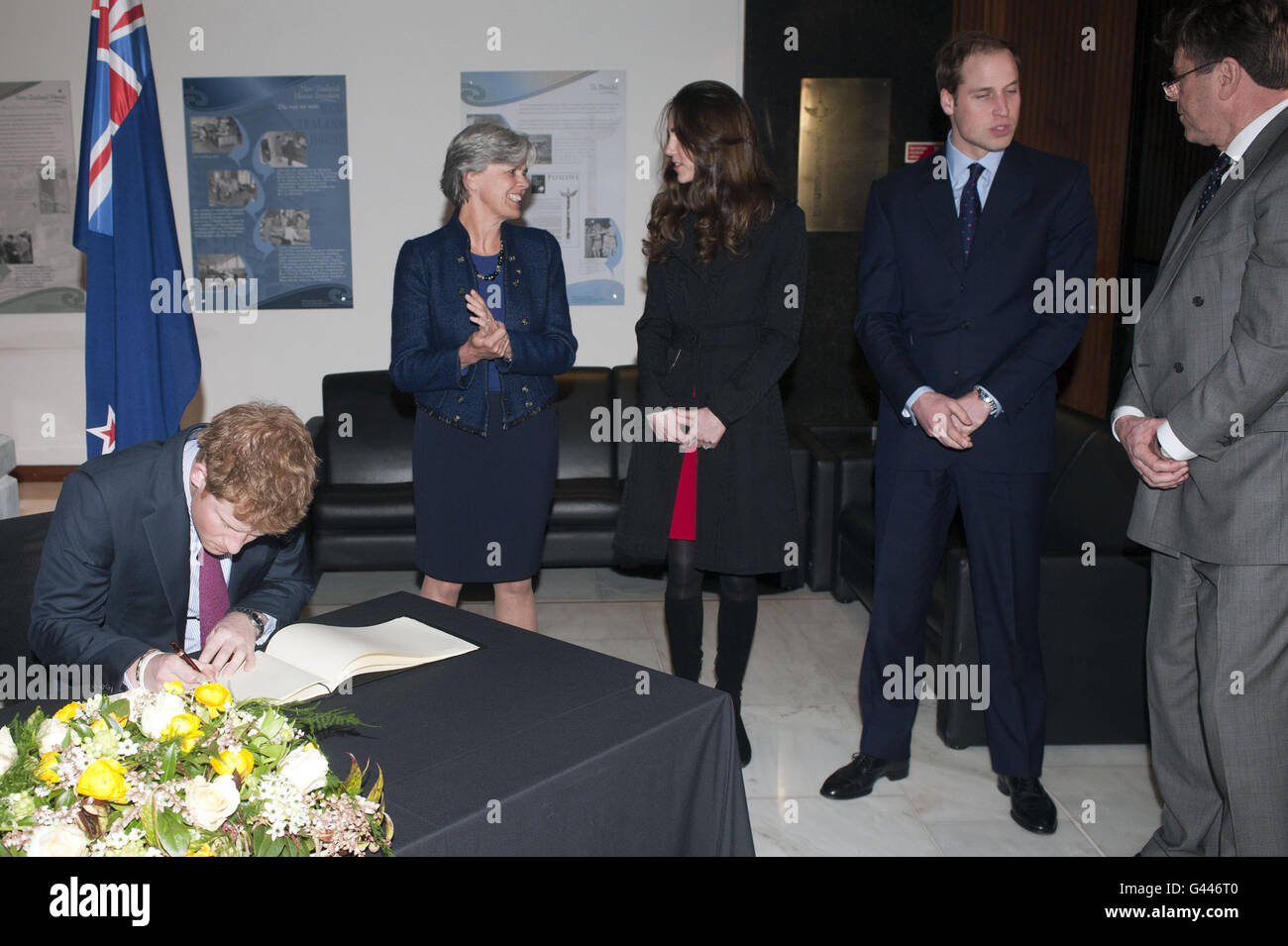 Prince Harry is watched by (From right to left) Deputy High ...
