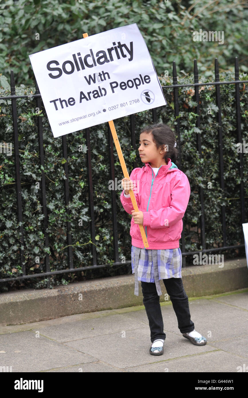 A young protester with the United We Stand: Solidarity With The Arab ...