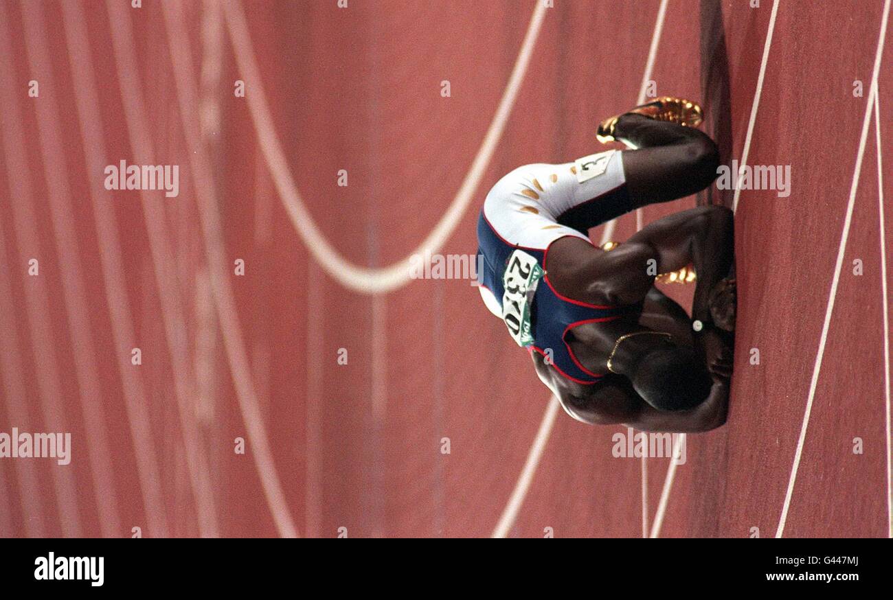 OLYMPICS Johnson on knees Stock Photo - Alamy