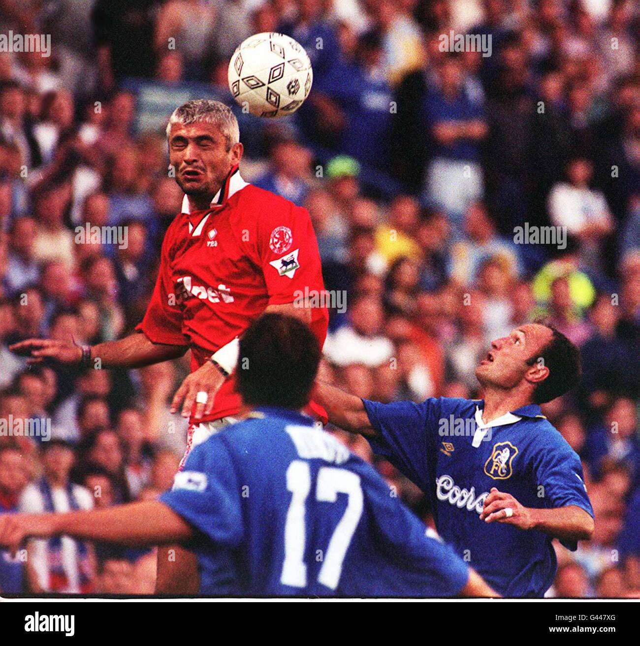 Middlesbrough's Fabrizio Ravanelli clears from Chelsea's Franck Lebouef ...