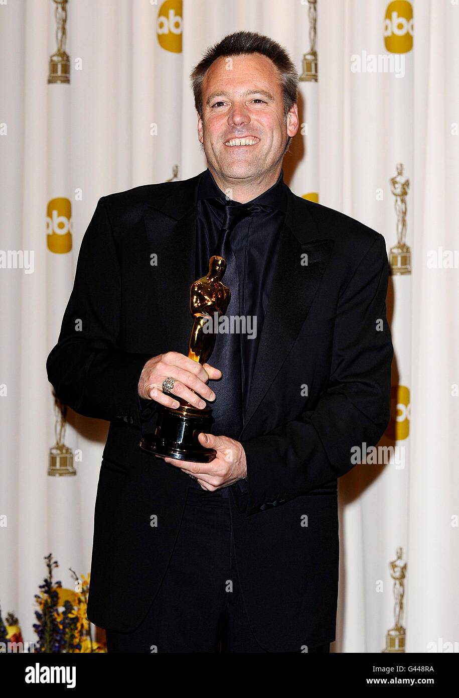 Wally Pfister with the Achievement in Cinematography award, received ...
