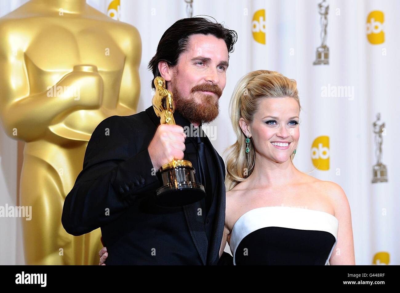 ** Christian Bale with the Best Supporting Actor award, received for ...