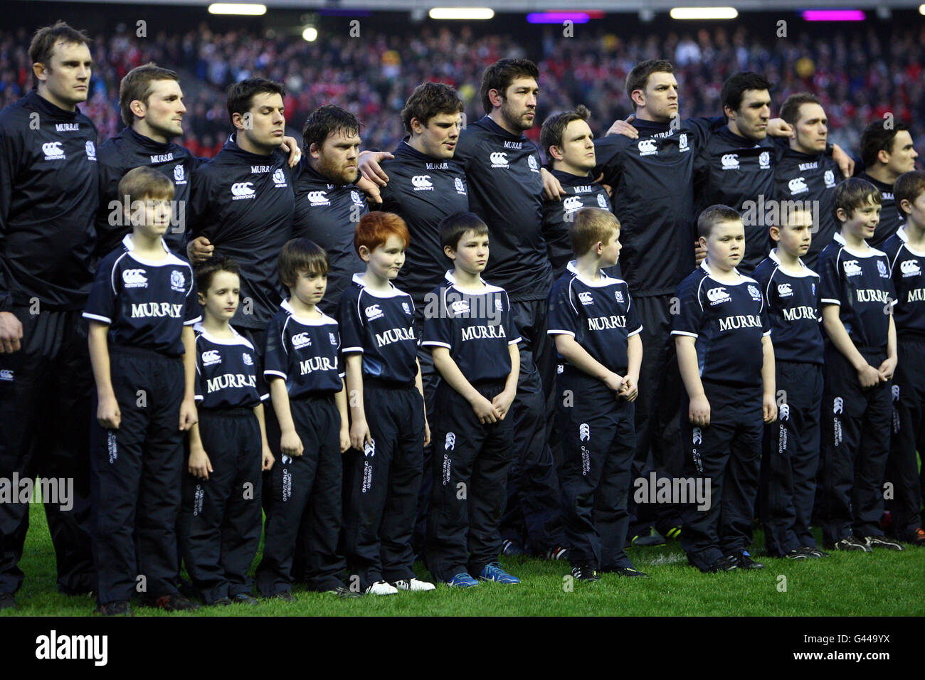 Scotland line up with the mascots before the game hi-res stock ...