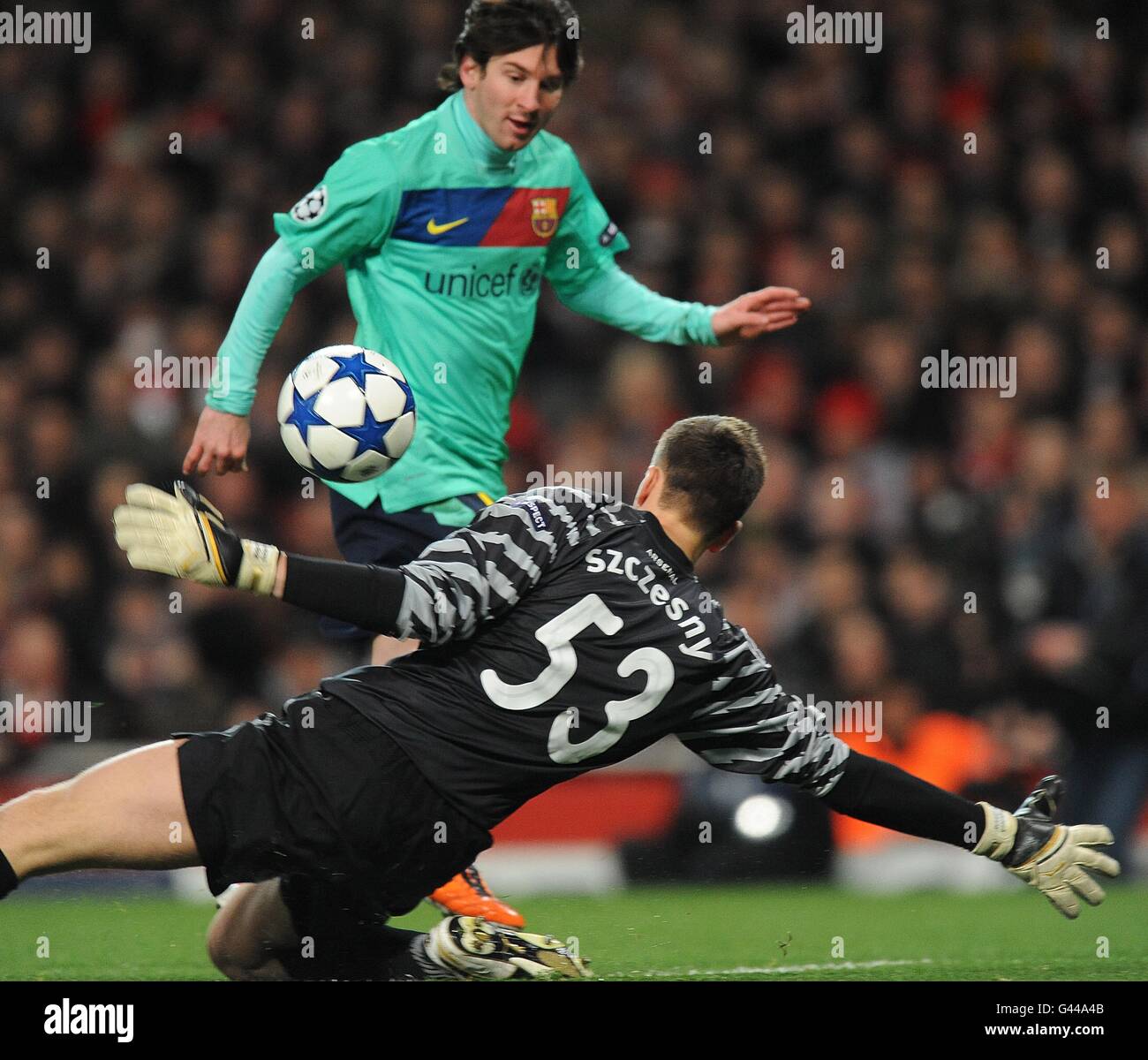 Barcelona's Lionel Messi (facing) takes a shot on goal Stock Photo - Alamy