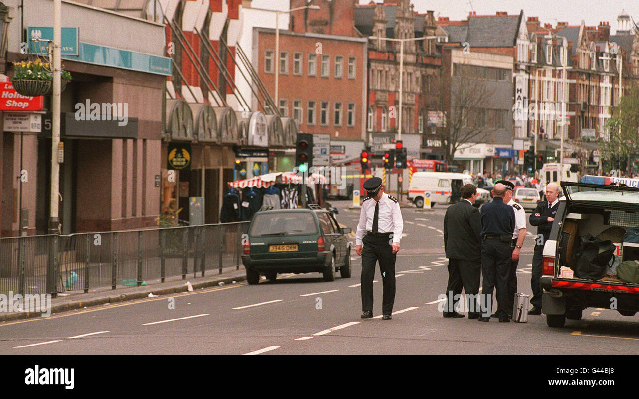 Police at the scene of a small explosion outside the Ealing Broadway ...