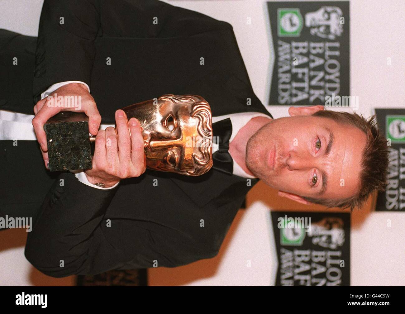Actor Tim Roth with his award for best performance by an actor in a ...