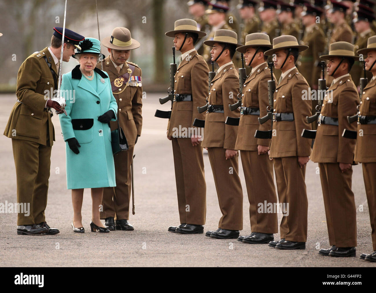 Queen Elizabeth II inspects the Queen's Gurkha Engineers Attestation ...