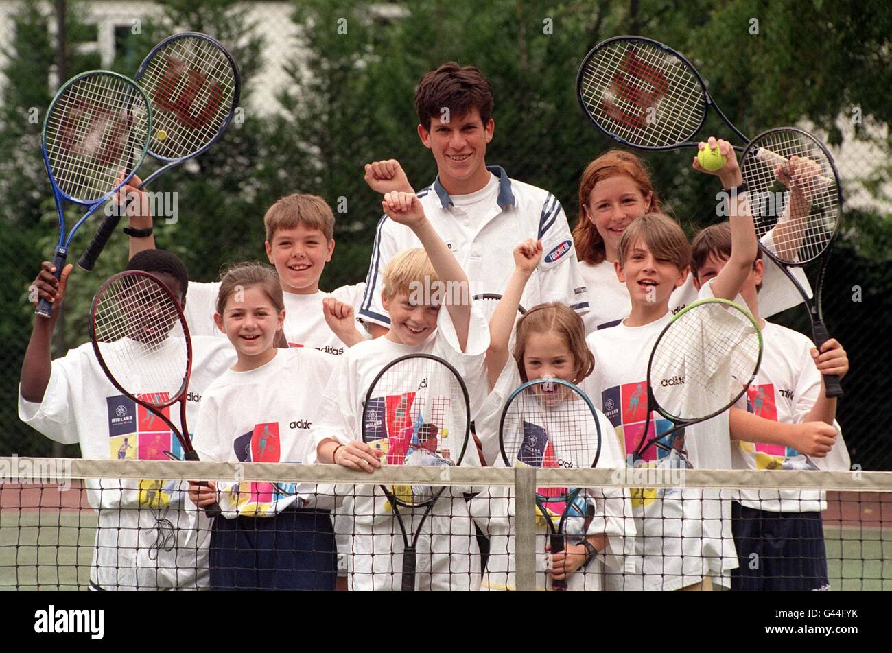 Britain's Wimbledon tennis hopeful Tim Henman during a coaching session ...