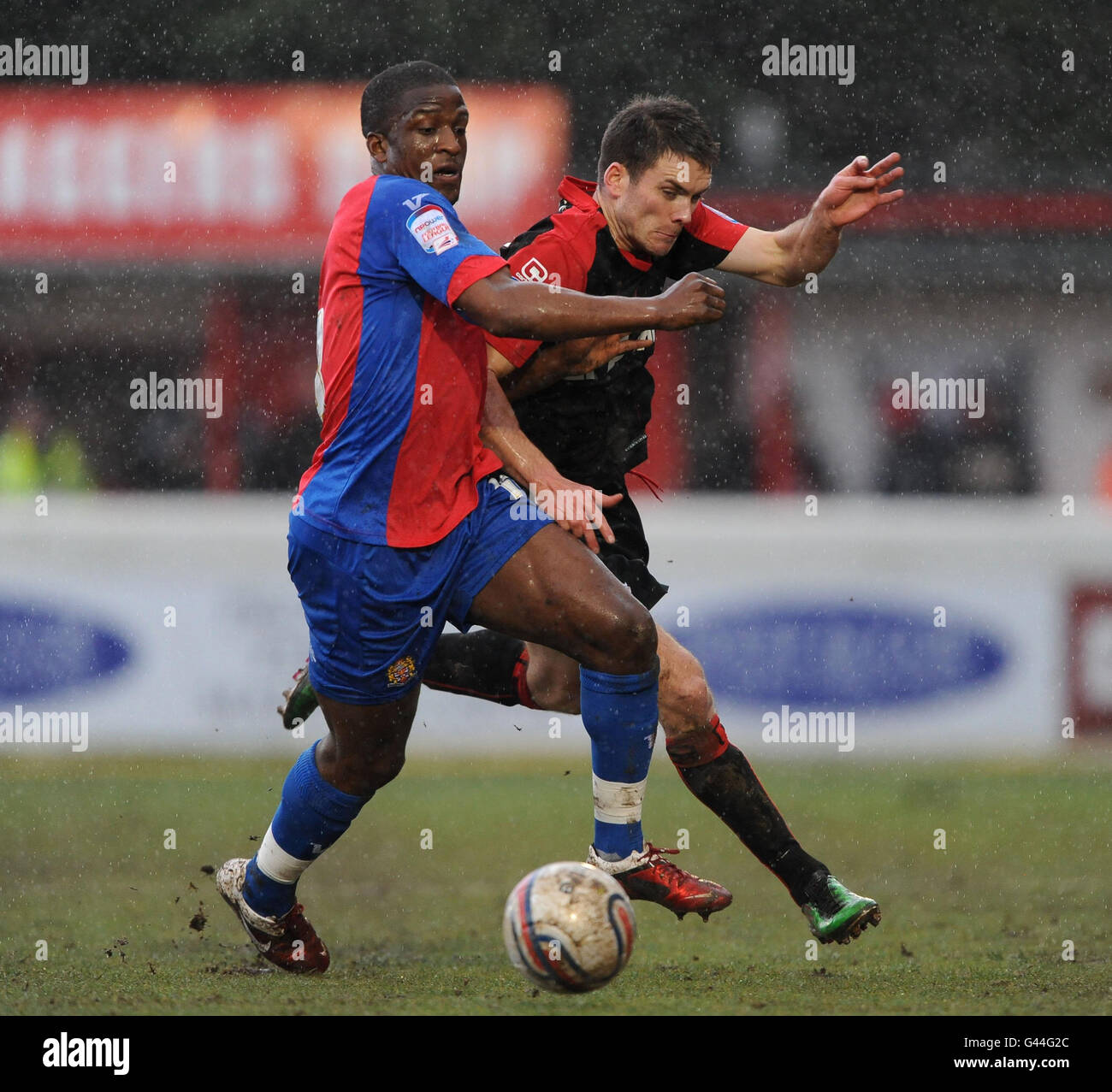 Dagenham & Redbridge's Solomon Taiwo and AFC Bournemouth's Rhoys ...
