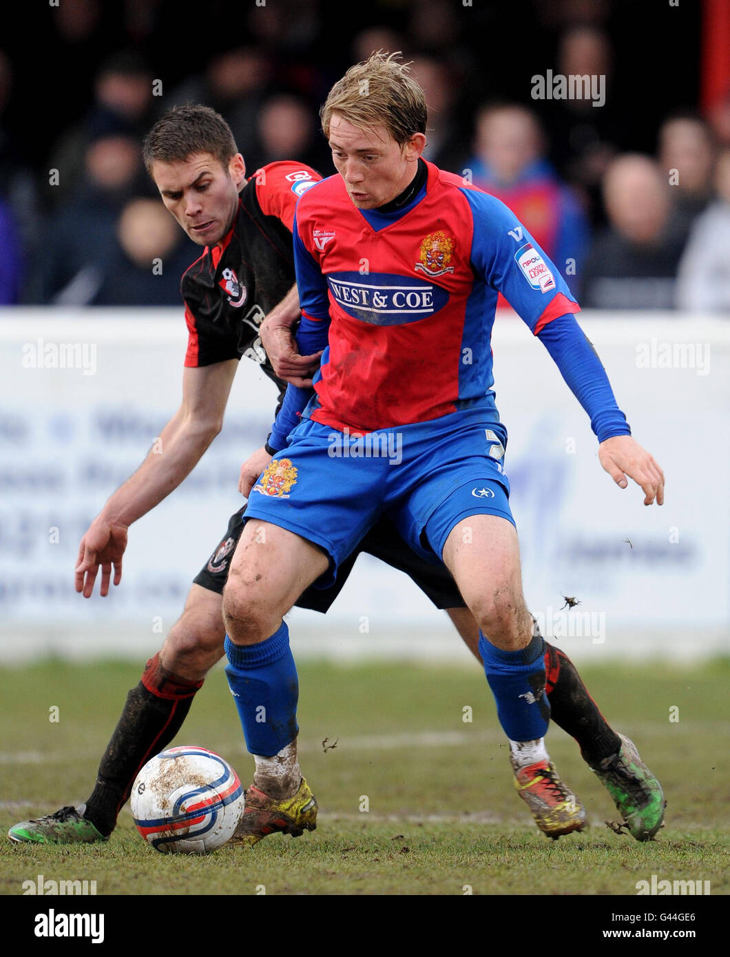 Dagenham & Redbridge's Danny Green and AFC Bournemouth's Rhoys Wiggins ...
