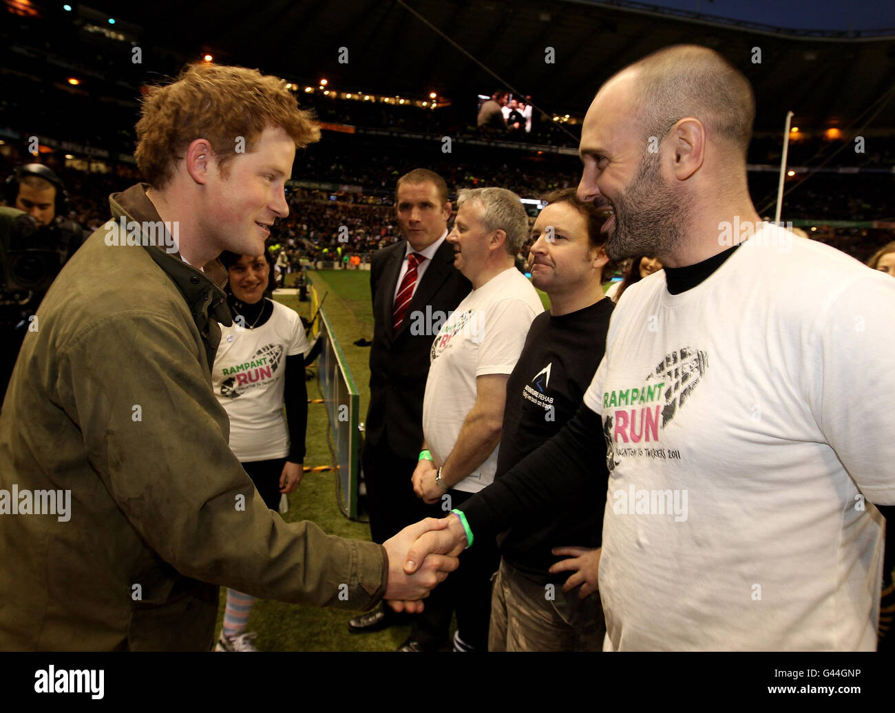 Prince Harry meets runners taking part in the "Rampant Run" in aid of ...