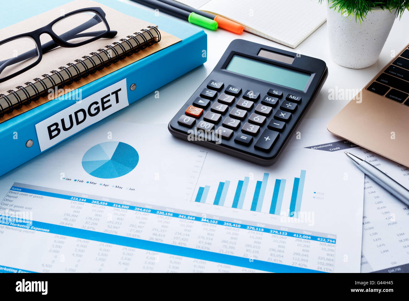 Financial and budget planning concept with calculator notebook and ...