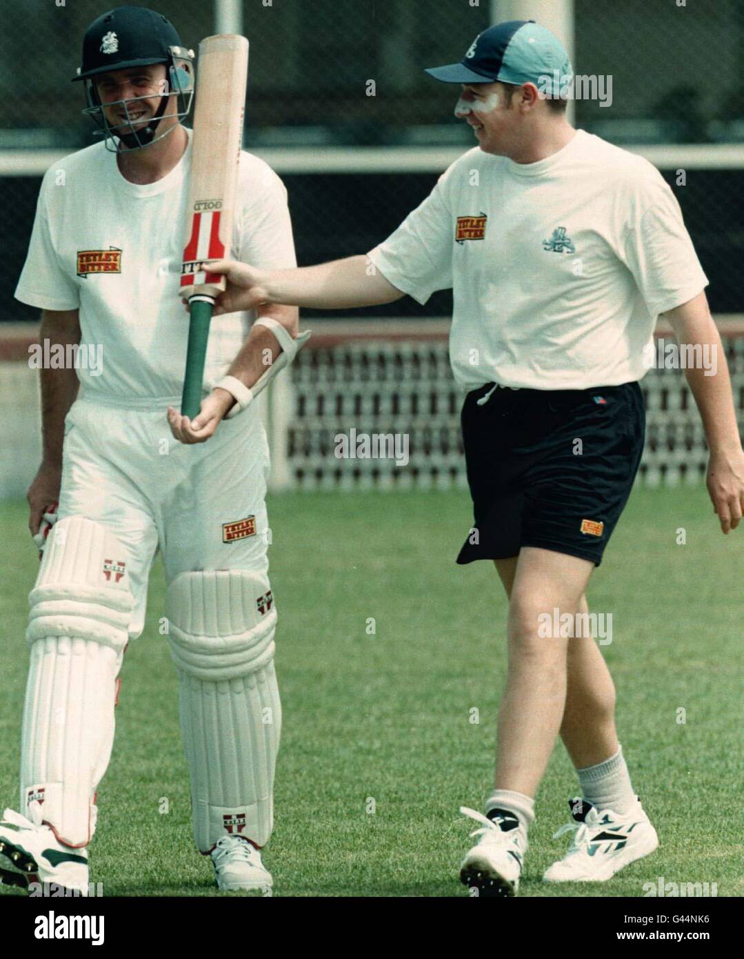 Phil Tufnell gets a few marching tips from Robert Croft during the ...