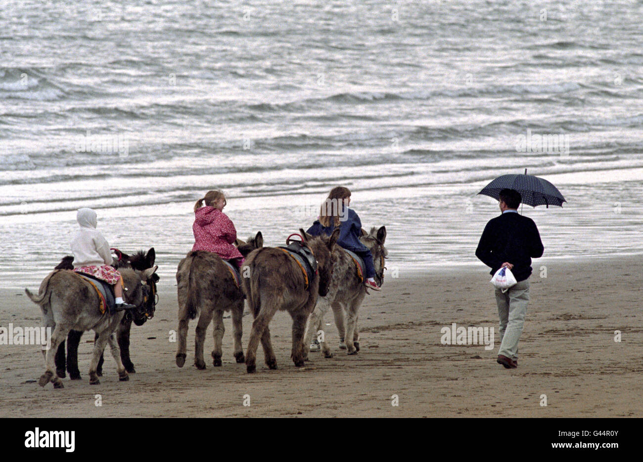Traditional bank holiday scene at Scarborough with visitors packing the ...