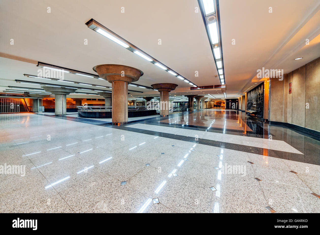 Interior of metro station with marble hall and neon lights Stock Photo ...