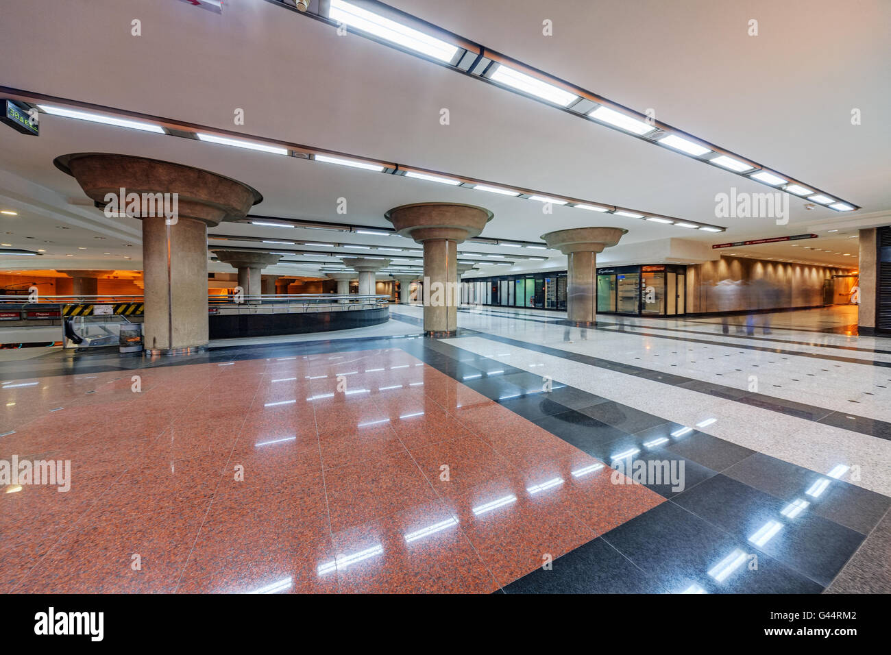 Interior of metro station with marble hall and neon lights Stock Photo ...