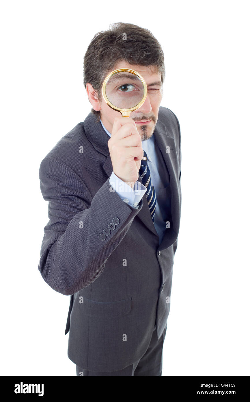 Isolated young business man with magnifying glass Stock Photo - Alamy