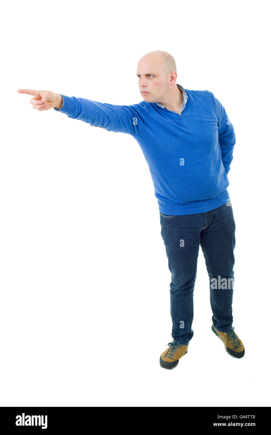 young casual man full body, pointing, isolated on a white background ...