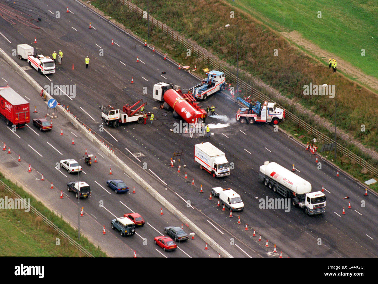 A lorry leaking liquid nitrogen lies on its side after crashing on the ...