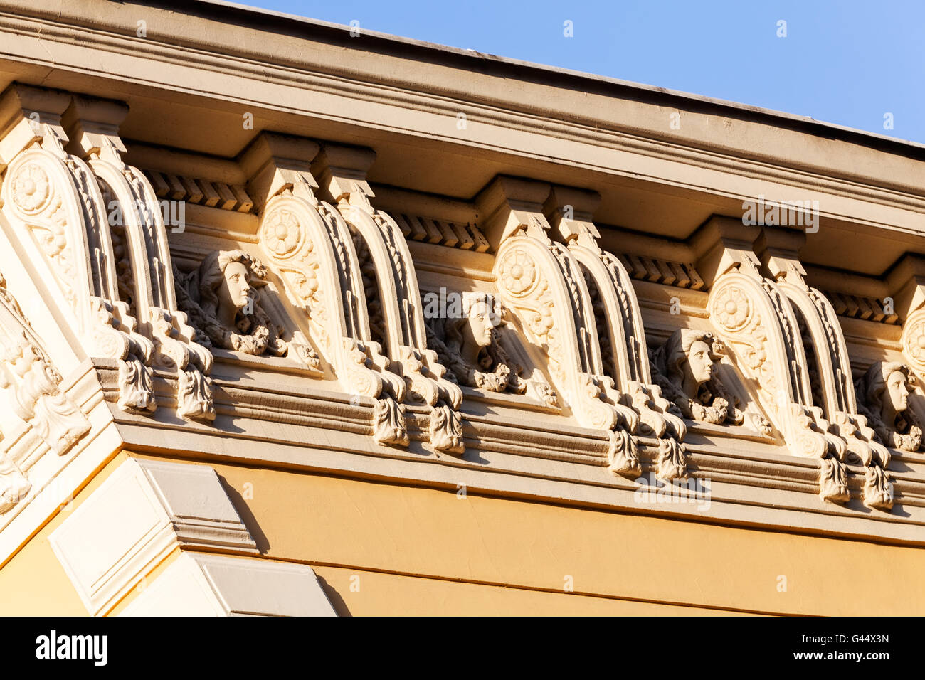 stone facade on classical building with ornaments and sculptures Stock ...