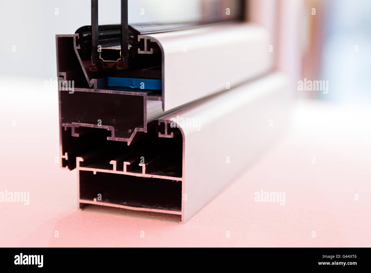 Cut of the window profile with metal, glass and insulation Stock Photo ...