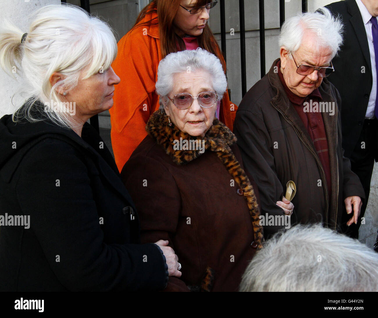 Sheila and James Patmore, helped by a family member (left, name not ...