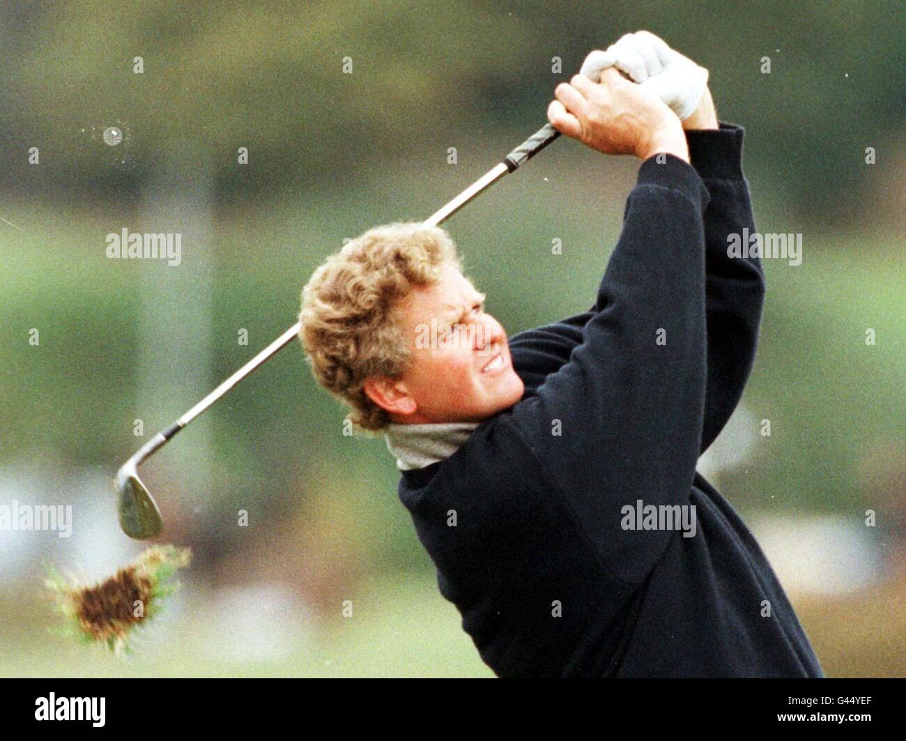 Scotland's Colin Montgomerie playing his fairway shot on the second ...