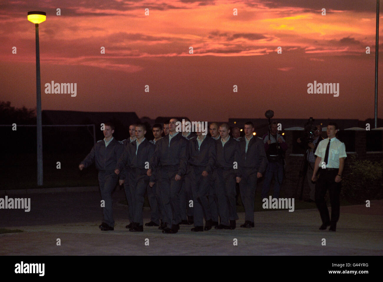 Dawn scene of inmates on square hi-res stock photography and images - Alamy