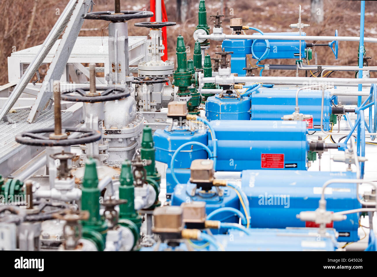 detail of oil pipeline with valves in large oil refinery Stock Photo ...