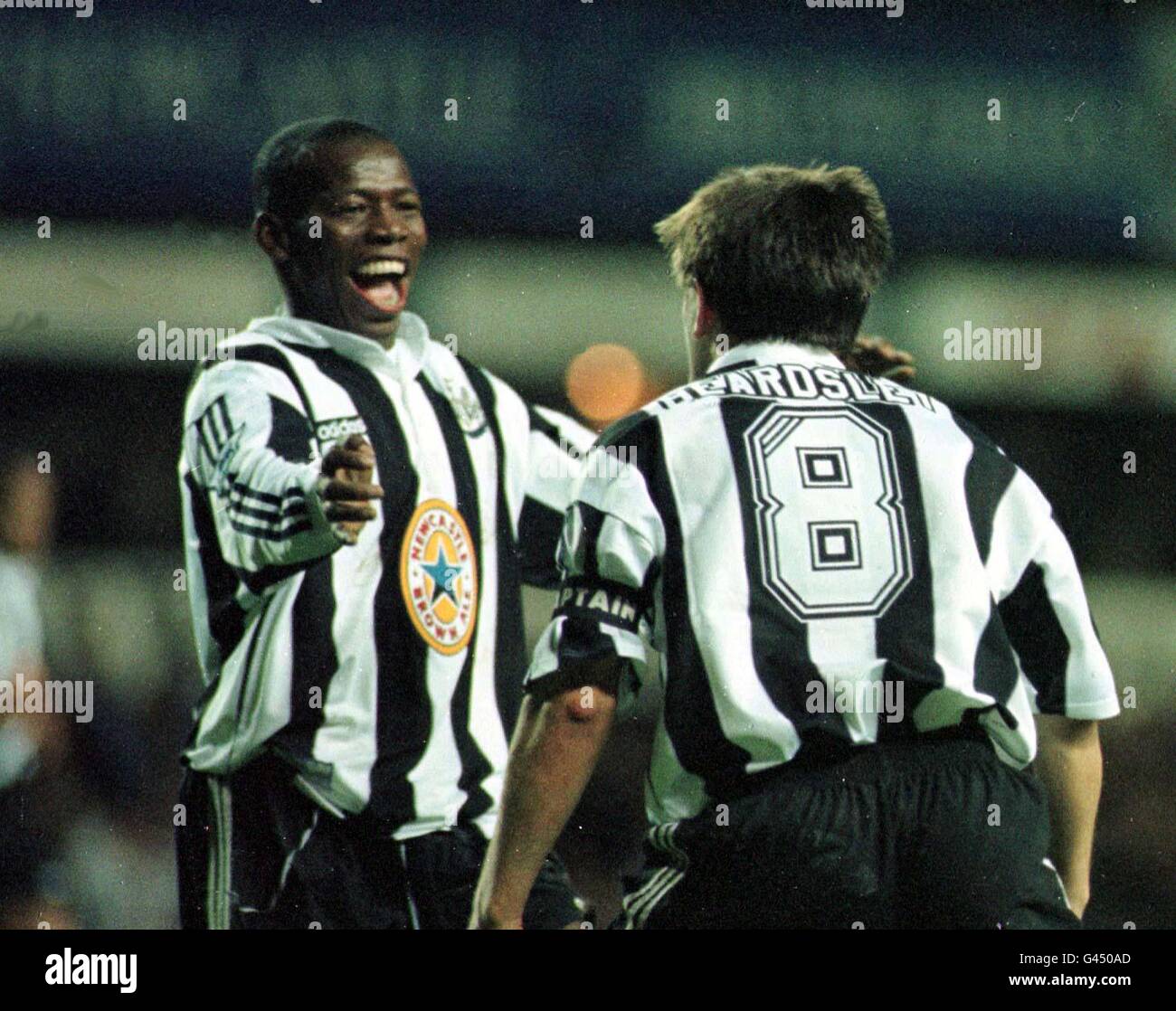Newcastle's Faustino Aspirilla (left) congratulates his team captain as ...