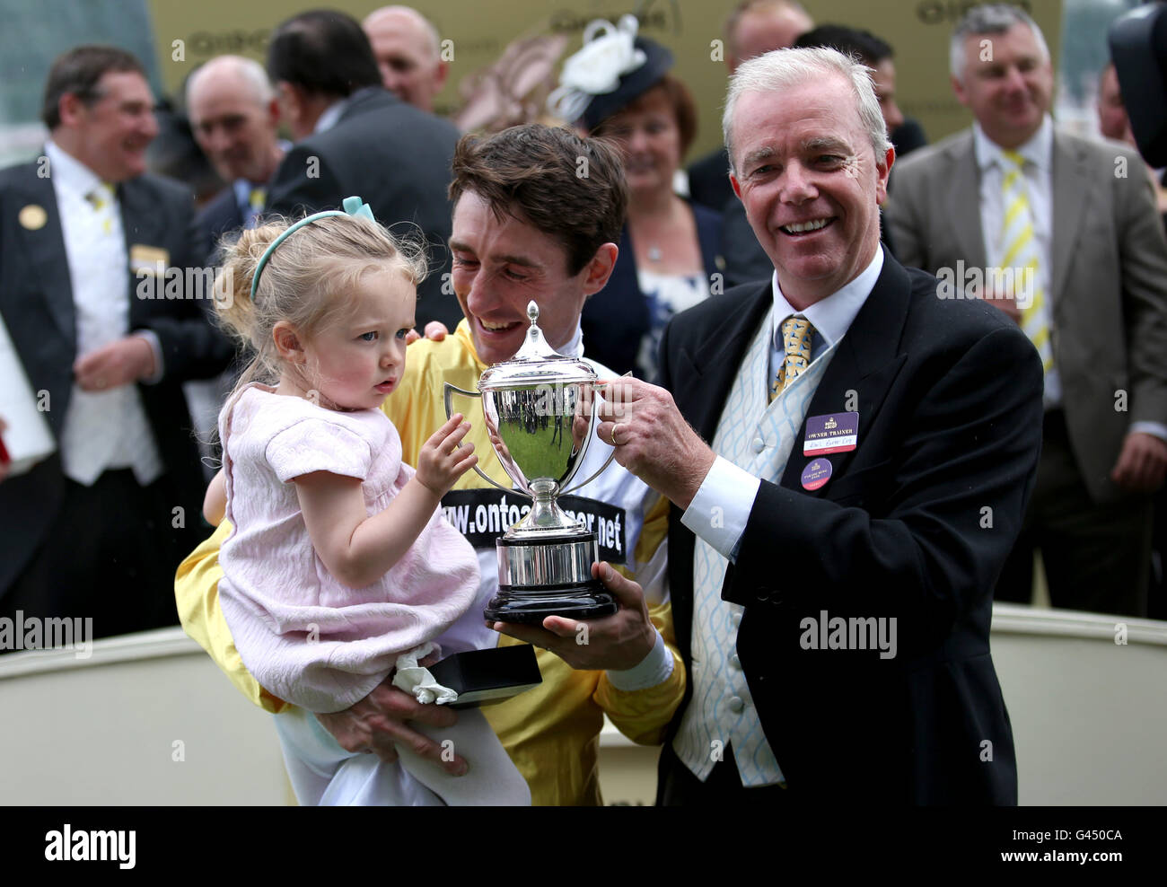 Jockey Dougie Costell and trainer Karl Burke (right) with the ...