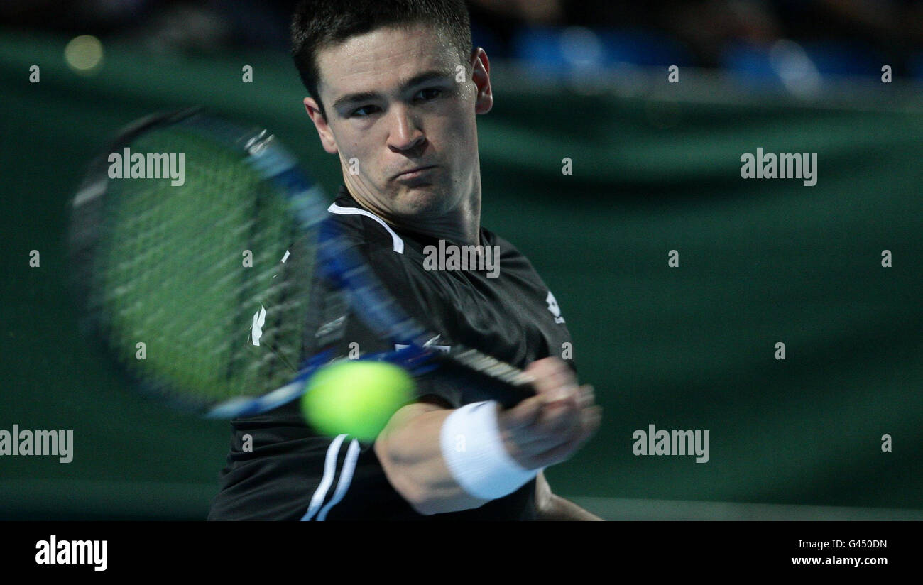 Great Britain's Jamie Baker plays a shot during his defeat to Tunisia's ...