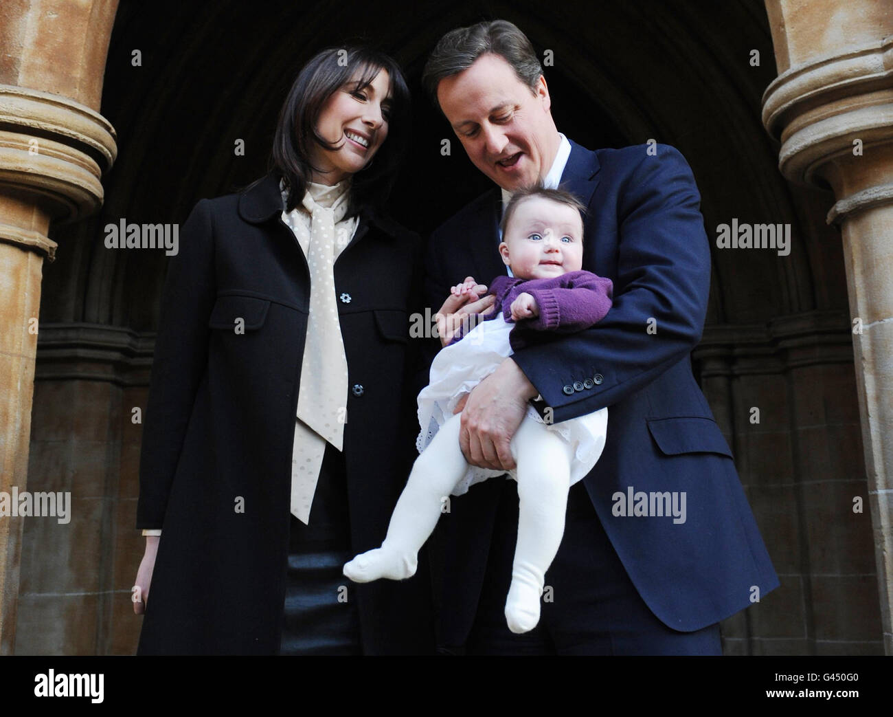 Prime Minister David Cameron and his wife Samantha with their daughter ...