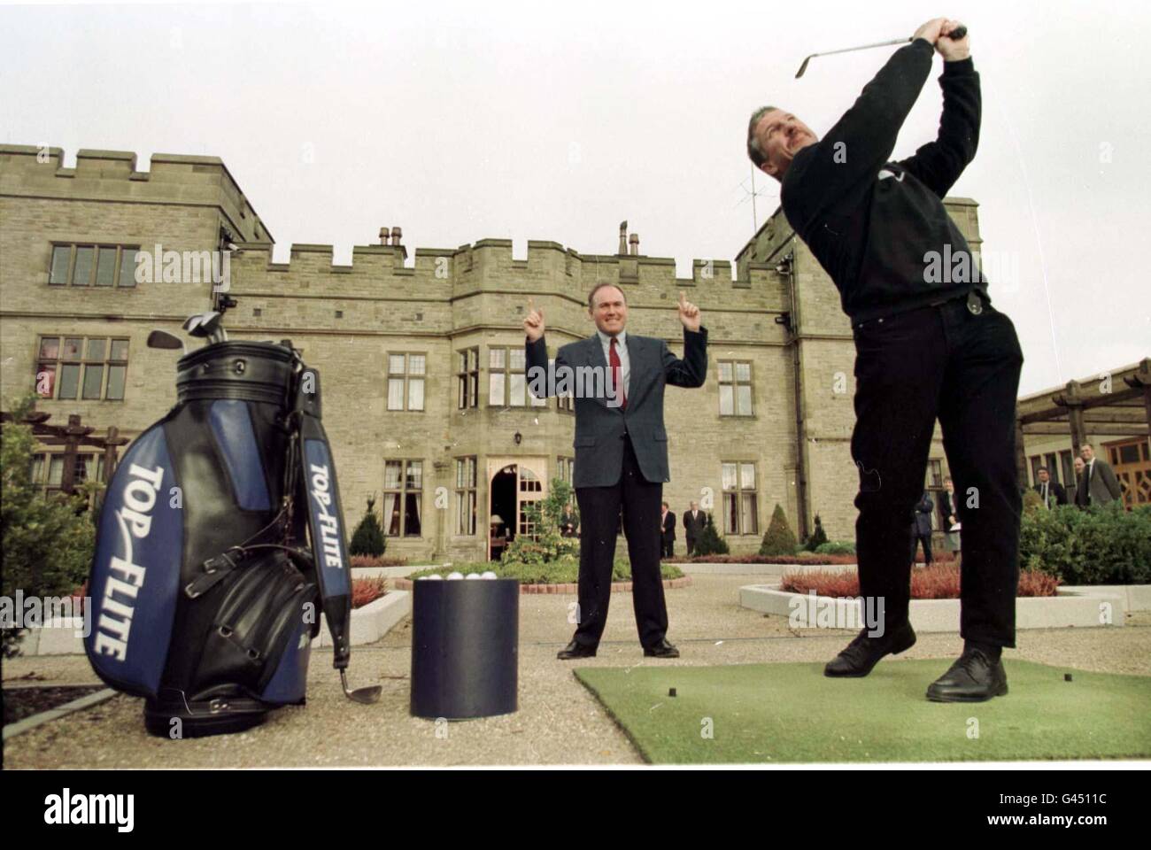 Golfer Ronan Rafferty gives cricketer Ian Botham a definite 6 at the ...