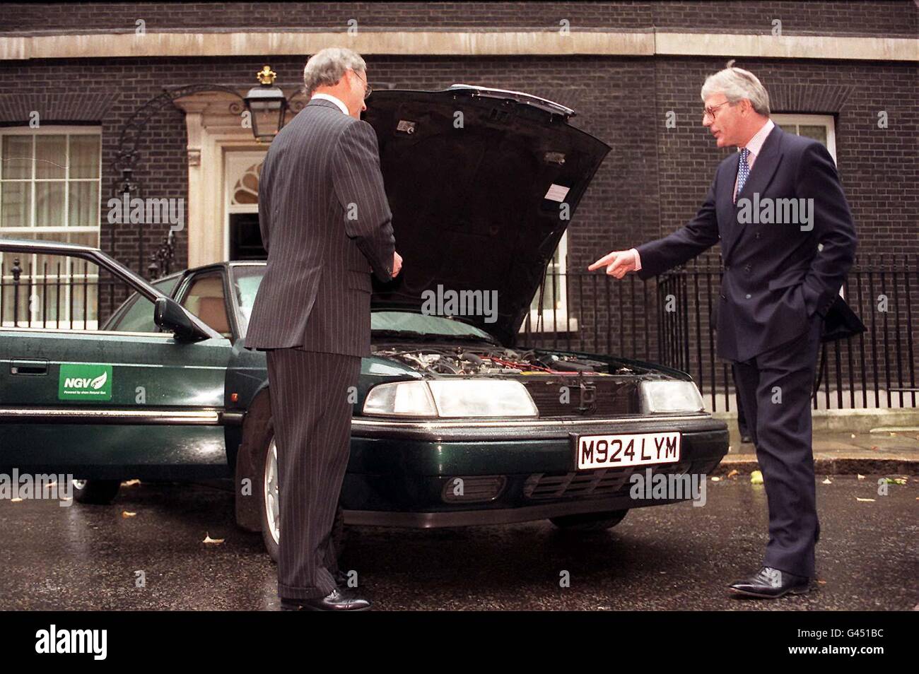 Prime Minister John Major points out a feature on the new Rover 827 gas ...