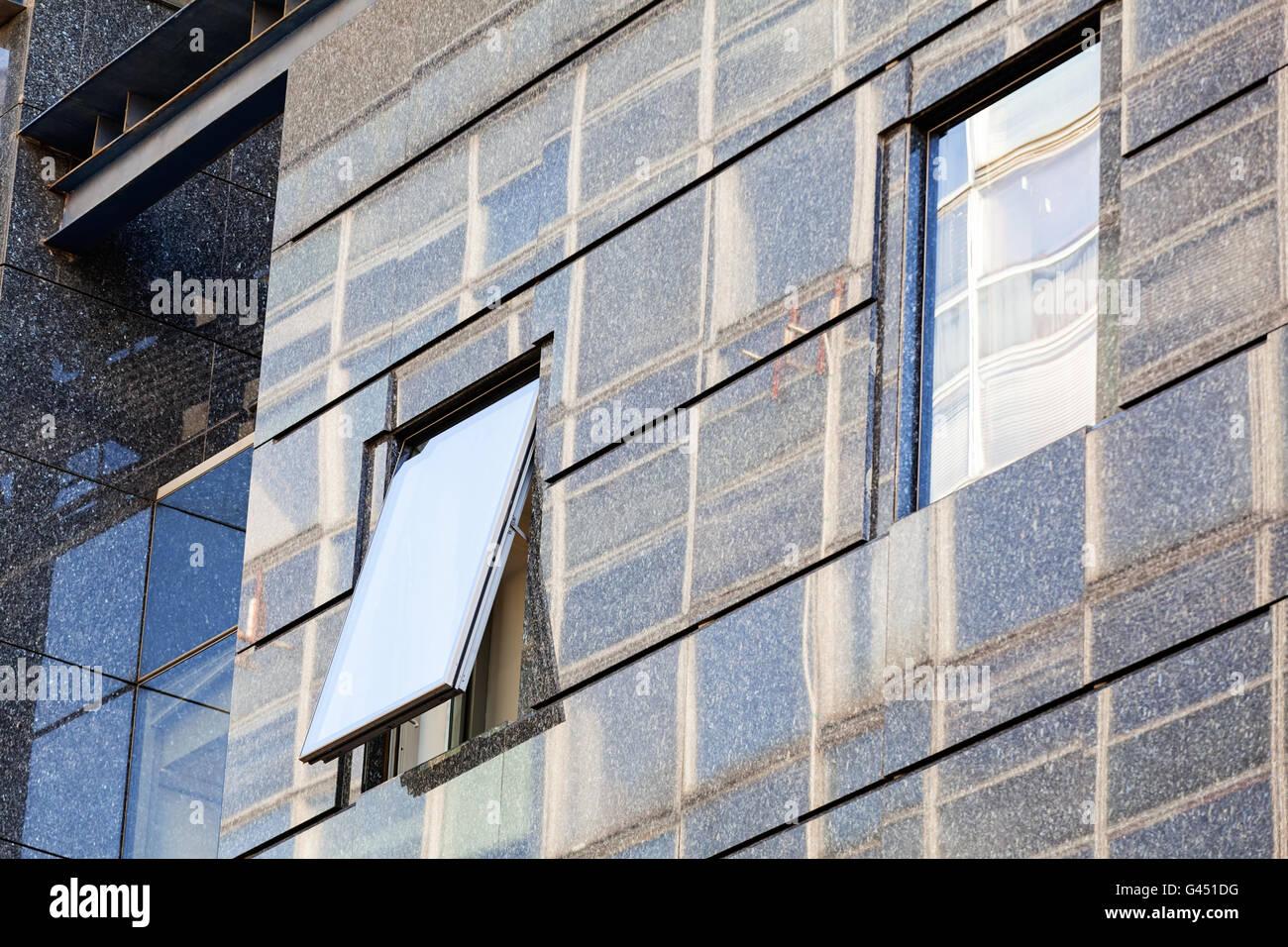 Modern building exterior with glass and metallic facade Stock Photo - Alamy