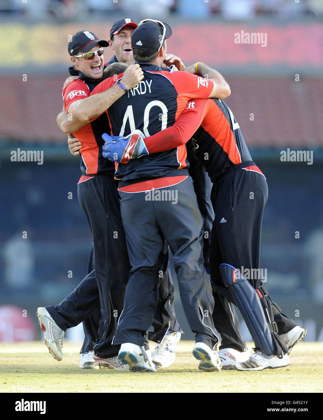 England's Stuart Broad (hidden) celebrates with team mates, after ...