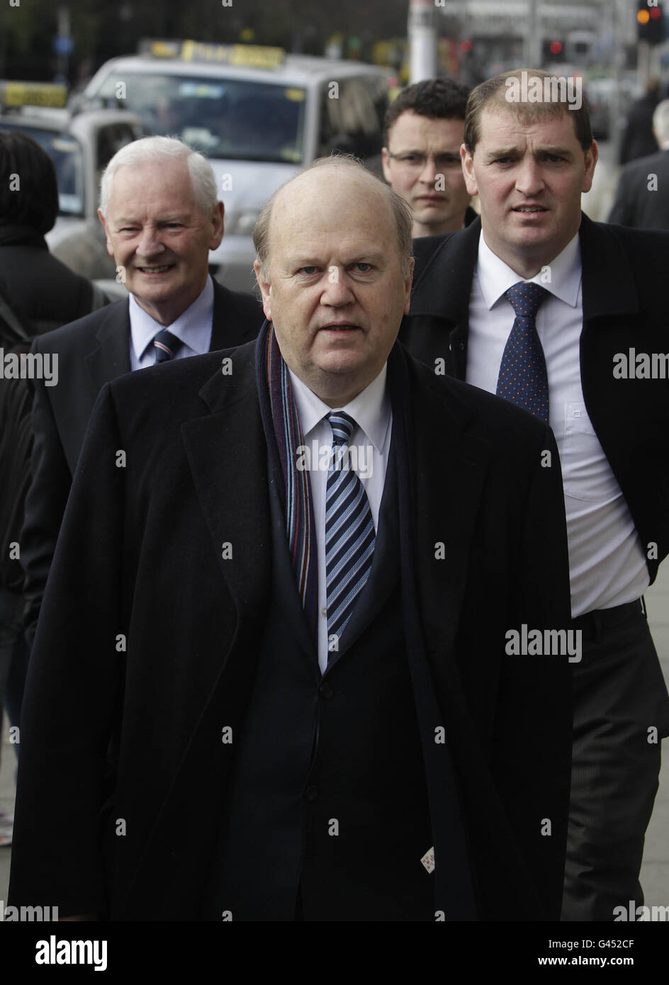Fine Gael finance spokesman Michael Noonan on his way into the first ...