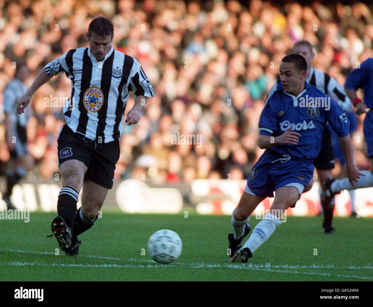 Newcastle United's Robert Lee (l) beats Chelsea's Dennis Wise to the ...