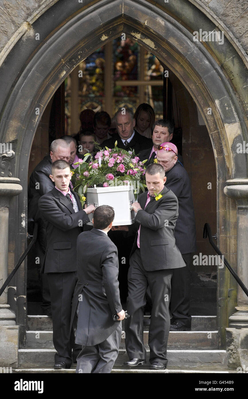 Family of mother-to-be Nikitta Grender carry her white coffin from St ...