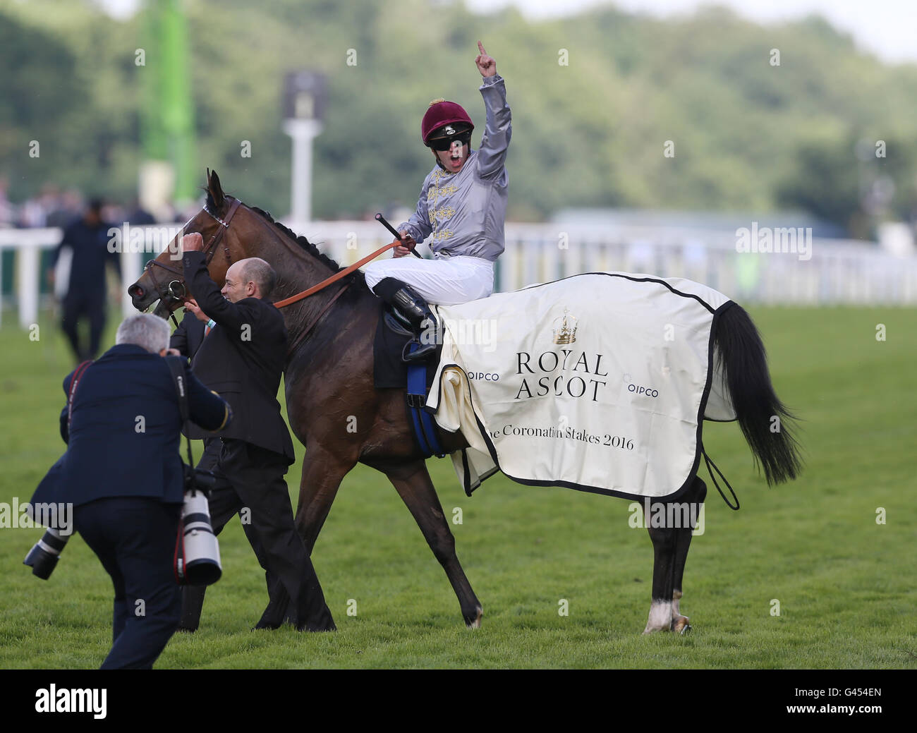 Gregory Benoist riding Qemah celebrates winning the Coronation Stakes ...