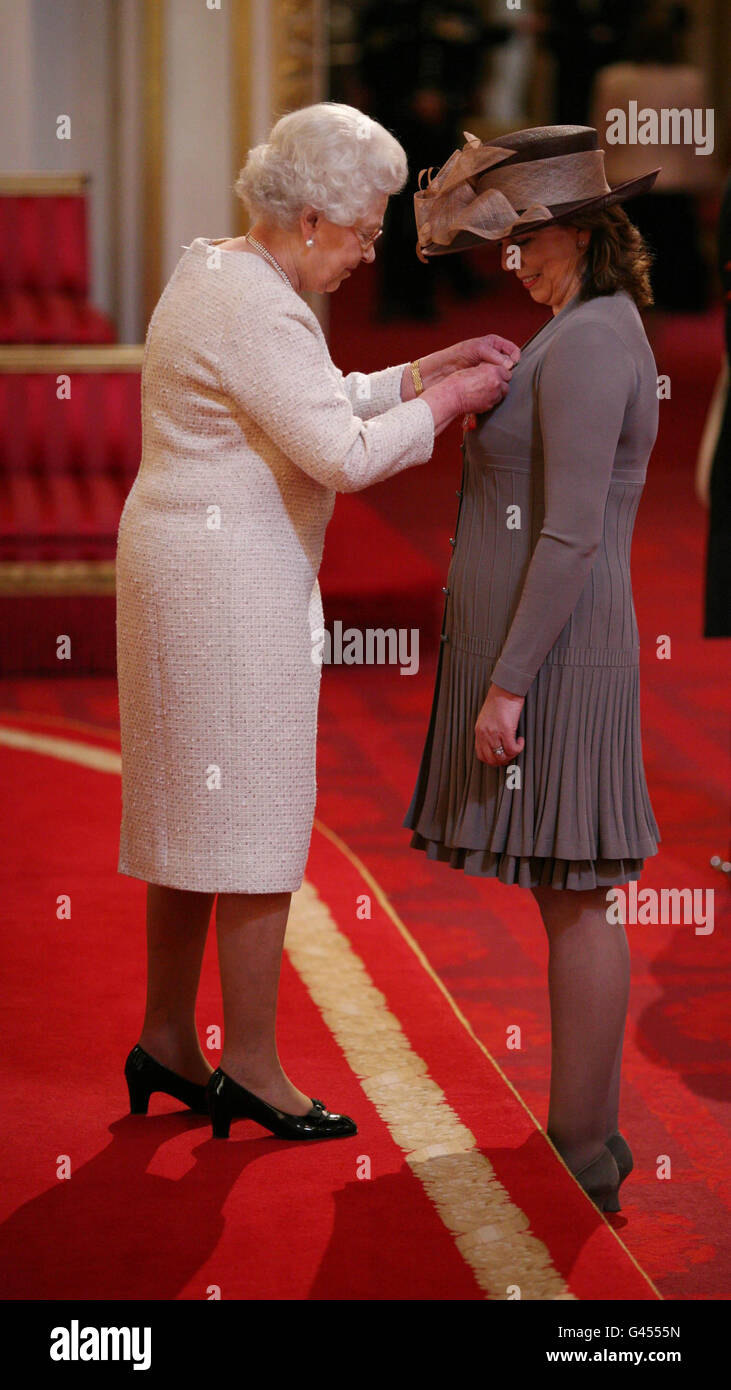 Which awarded him by queen elizabeth ii buckingham palace hi-res stock ...
