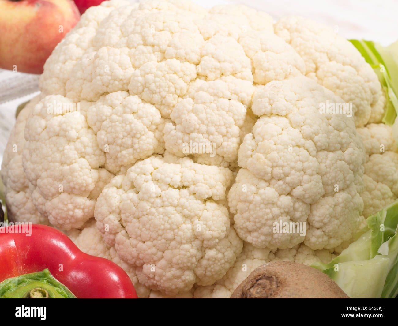 a cauliflower and some fresh vegetables Stock Photo - Alamy