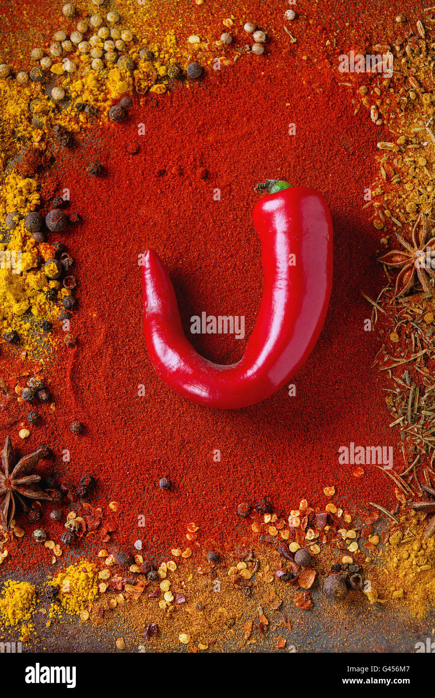 Spicy background with assortment of different hot chili peppers and mix ...