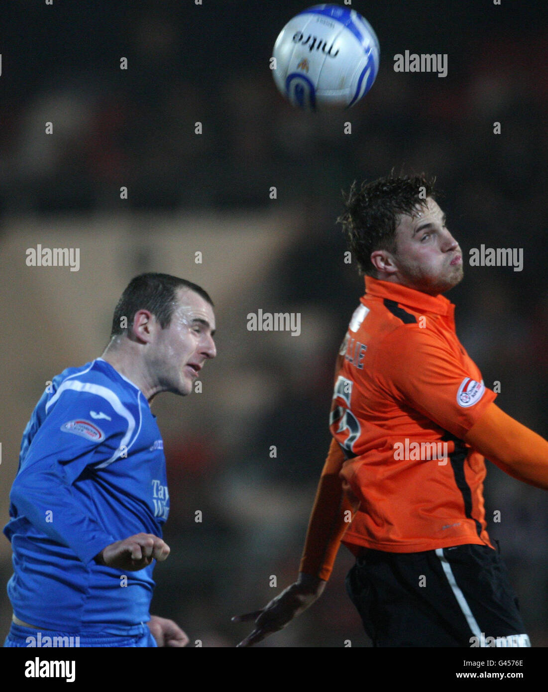 Dundee United's David Goodwillie and St Johnstone's Dave McKay during ...