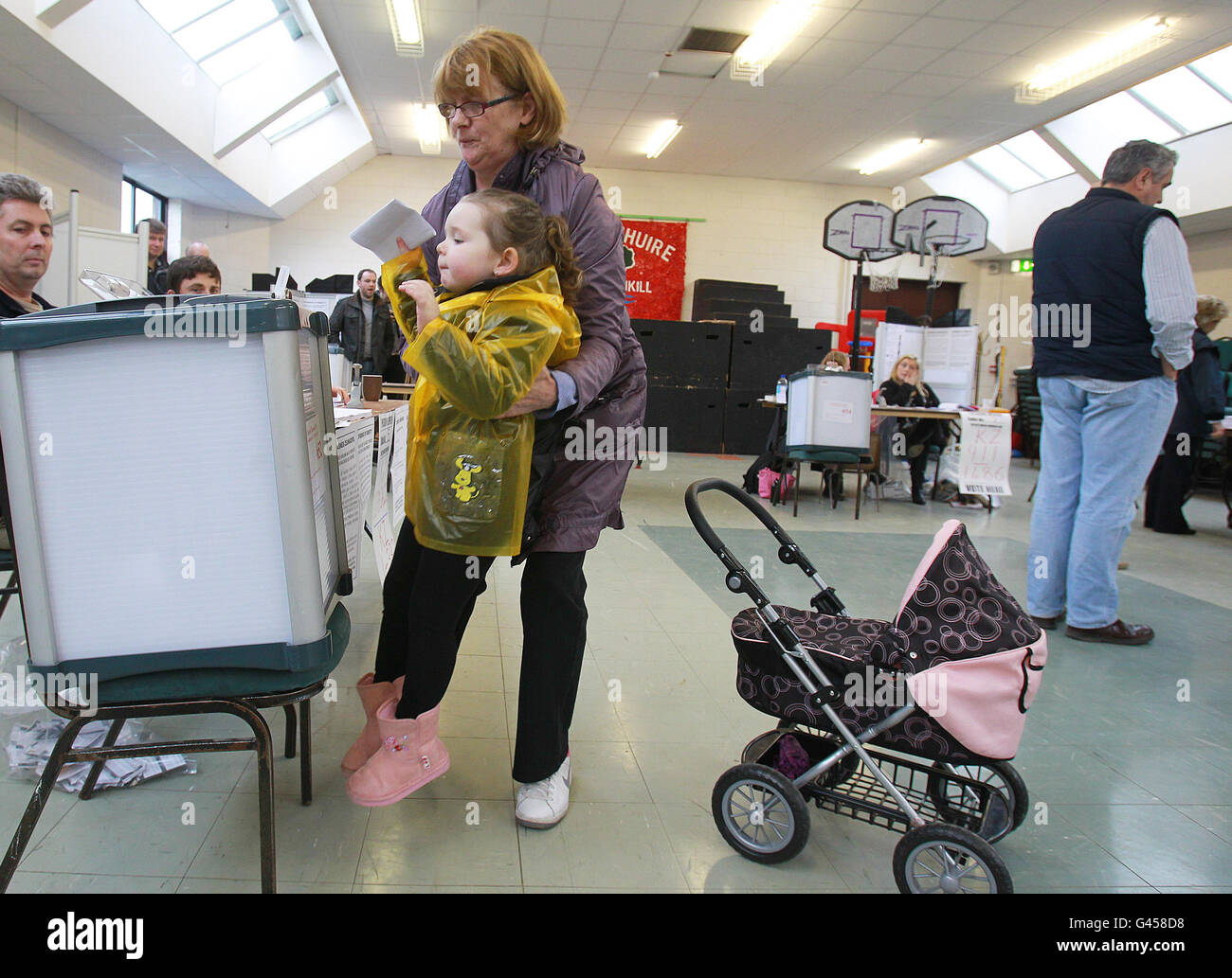 Kathleen Dodd with her granddaughter Ruby as she casts her vote in the ...