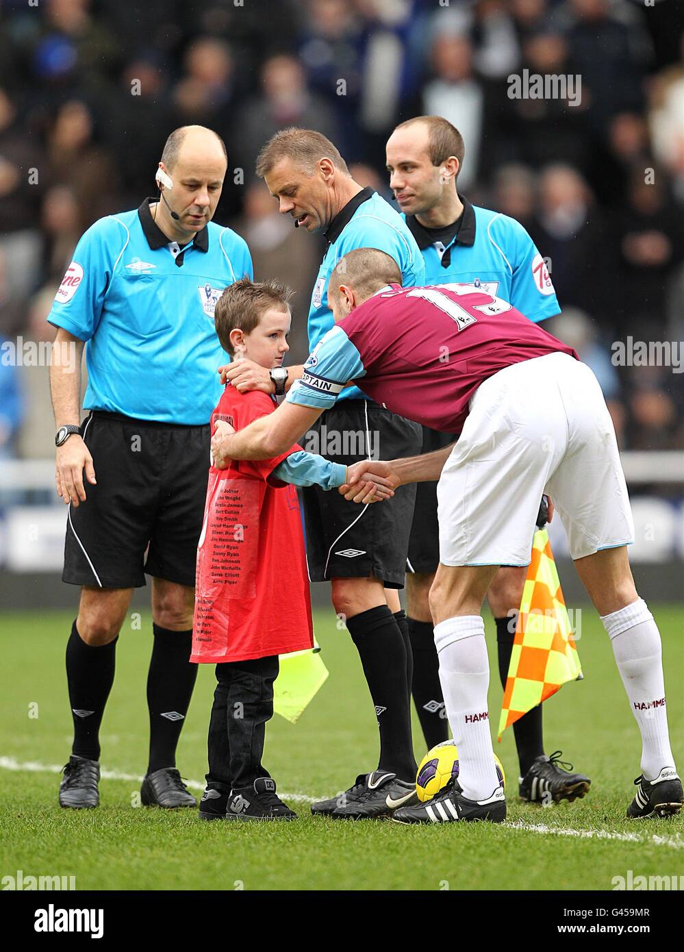Referee Mark Halsey with schoolboy Jonjo Heuerman who who has completed ...