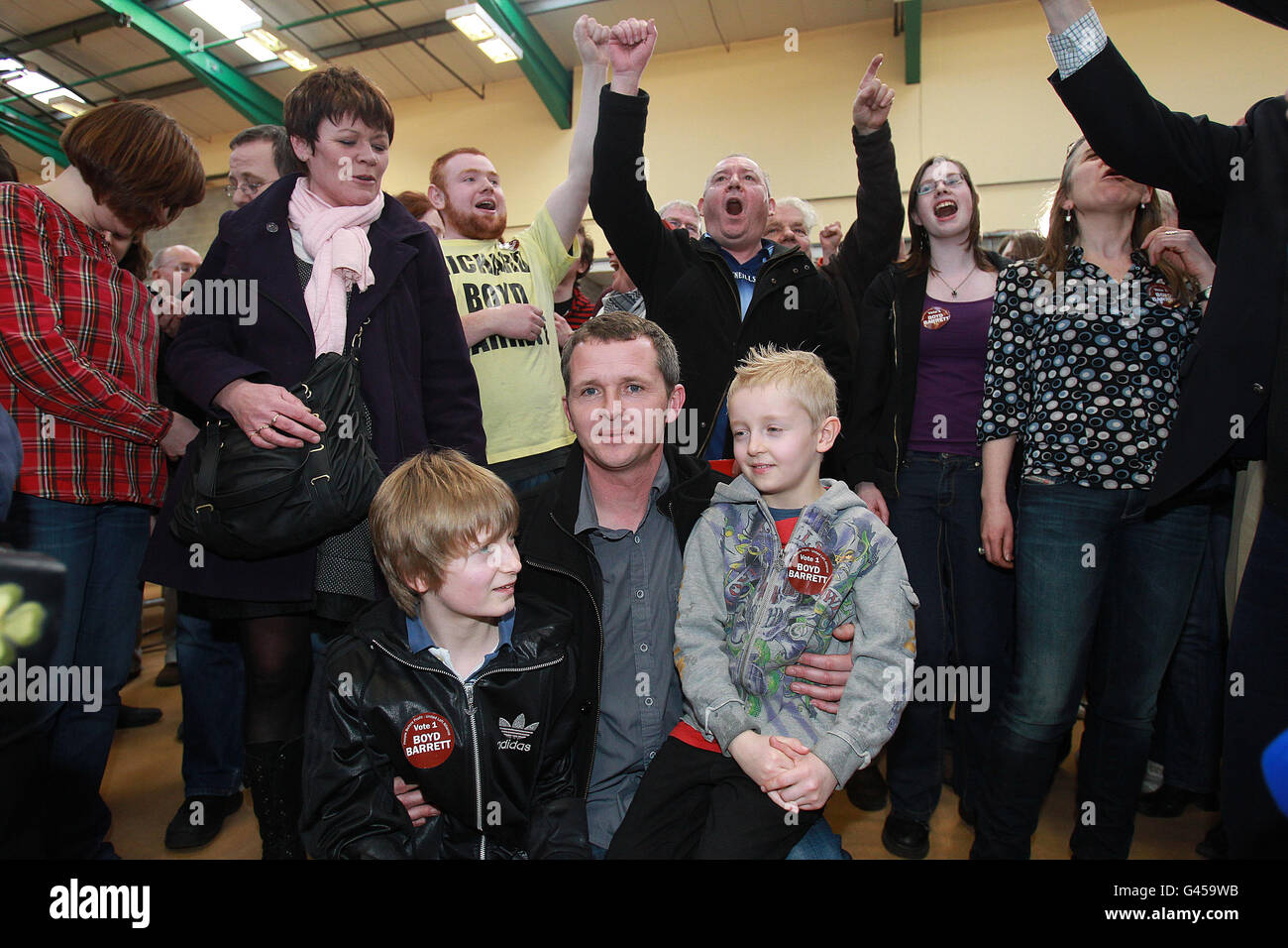 United Left Alliance candidate Richard Boyd Barrett (front) with son's ...