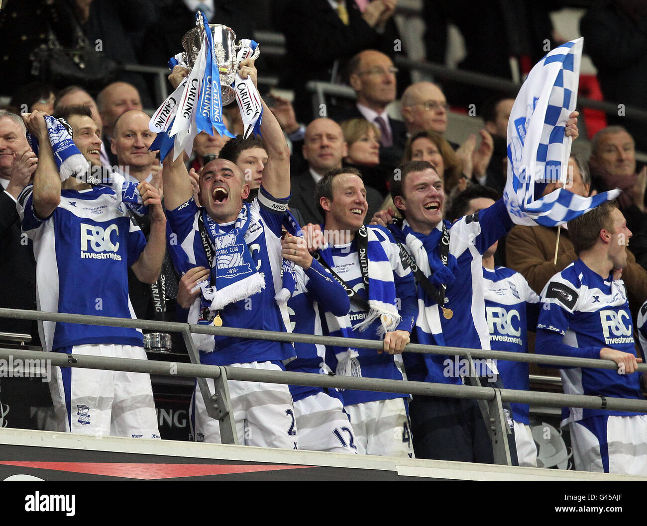 Birmingham city captain stephen carr lifts the carling cup trophy hi ...